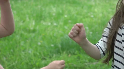 Slow Motion Girls playing game of rock-p... | Stock Video | Pond5
