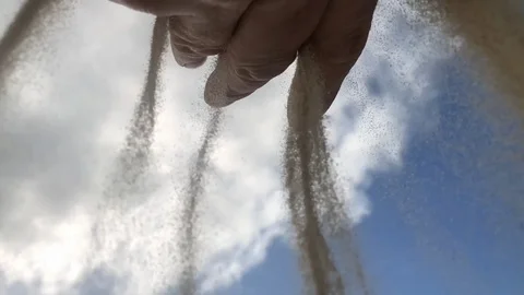 Sand Falling From Hand Stock Video Footage | Royalty Free Sand Falling ...