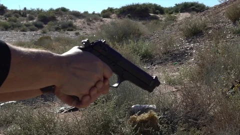 Gun Firing Slow Stock Footage ~ Royalty Free Stock Videos | Pond5