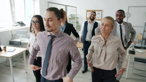 Slow motion of happy office workers danc... | Stock Video | Pond5