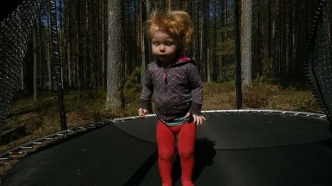 Slow motion, kids, little girls, jump on... | Stock Video | Pond5