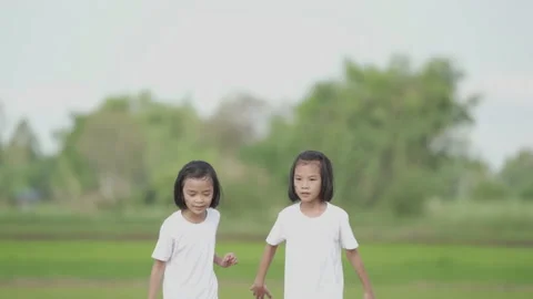 Slow motion kids playing and running on ... | Stock Video | Pond5
