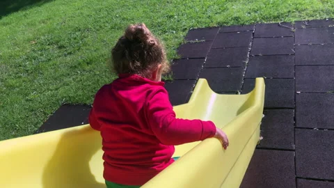 Slow Motion: little child girl play on p... | Stock Video | Pond5
