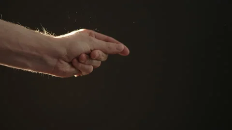 Slow motion man hand playing with sun li... | Stock Video | Pond5