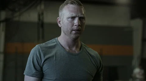 slow motion man lifting cement ball at g... | Stock Video | Pond5