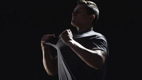 Ripping Shirt Stock Footage ~ Royalty Free Stock Videos | Pond5