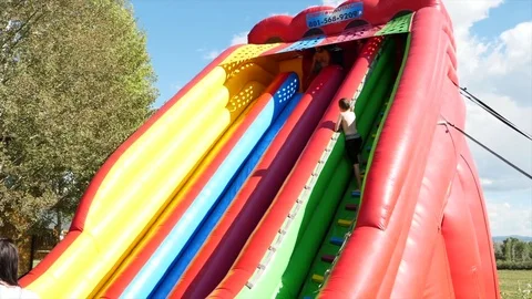 Girl Going Down Waterslide Stock Footage ~ Royalty Free Stock Videos ...