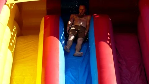 Girl Going Down Waterslide Stock Footage ~ Royalty Free Stock Videos ...