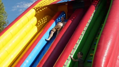 Girl Going Down Waterslide Stock Footage ~ Royalty Free Stock Videos ...