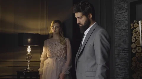 slow motion melancholy lady stern man sa... | Stock Video | Pond5