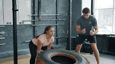 Slow motion of muscular girl lifting hea... | Stock Video | Pond5