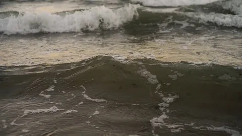 Slow motion ocean waves crashing on a tr... | Stock Video | Pond5
