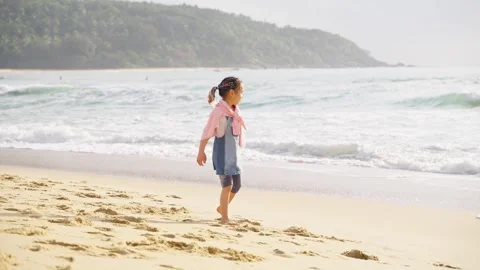 slow motion of one happy little asian gi... | Stock Video | Pond5