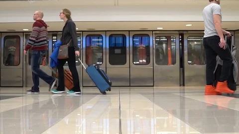 Slow motion people walking off and on th... | Stock Video | Pond5