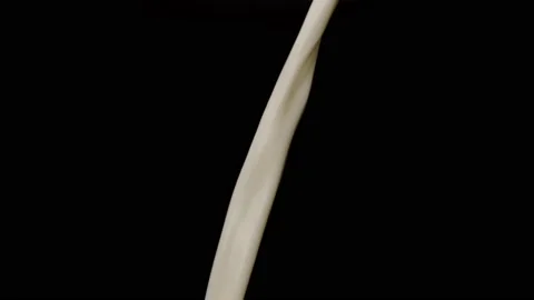 Slow motion Pouring fresh milk moving on... | Stock Video | Pond5