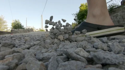 Kicking Rocks Stock Videos – Royalty-Free HD & 4K Videos