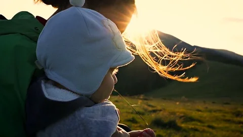 Slow motion scene of a young mother with... | Stock Video | Pond5