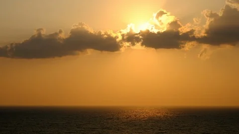 Slow motion of scenic orange sunset sky ... | Stock Video | Pond5