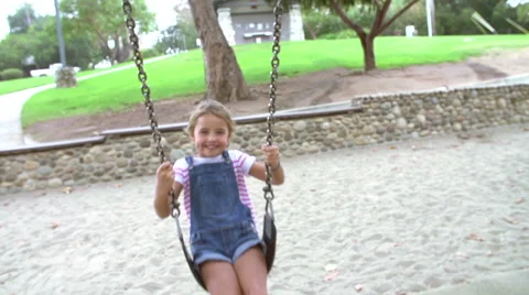 Slow Motion Sequence Of Girl On Swing In... | Stock Video | Pond5