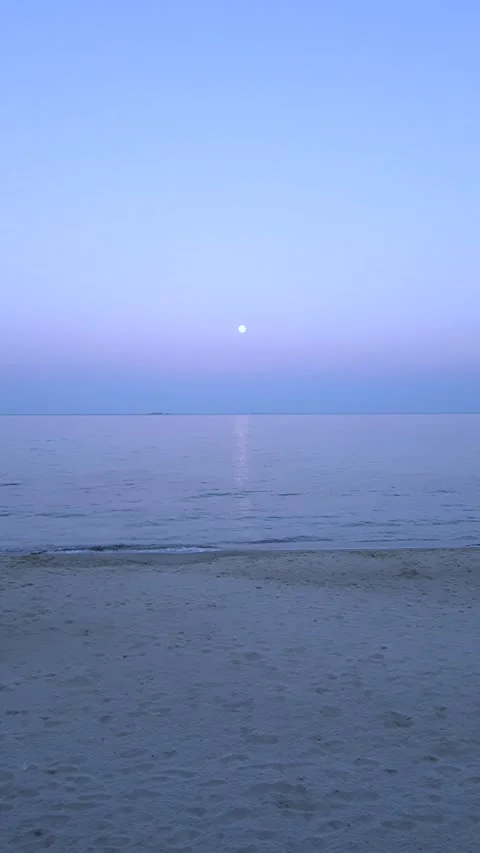 Slow motion shooting of the sunset at se... | Stock Video | Pond5