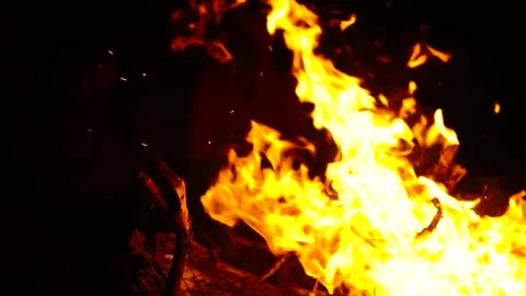 Slow motion shot of Bonfire with sparks ... | Stock Video | Pond5
