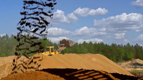 Slow motion shot of falling sand and roc... | Stock Video | Pond5