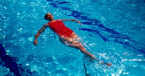 Slow motion shot of female swimmer float... | Stock Video | Pond5