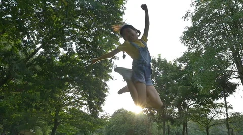 Slow motion shot : Happy Asian little gi... | Stock Video | Pond5