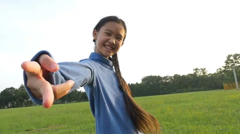 Slow motion shot : Happy Asian little gi... | Stock Video | Pond5