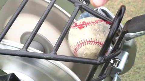 Slow Motion shot of pitching machine | Stock Video | Pond5