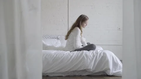 Slow motion shot of Sad Girl sitting on ... | Stock Video | Pond5