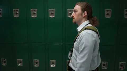 Slow motion side view of sad male teache... | Stock Video | Pond5