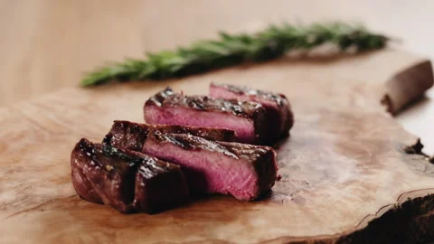 Slow motion slide sliced rare fillet mig... | Stock Video | Pond5