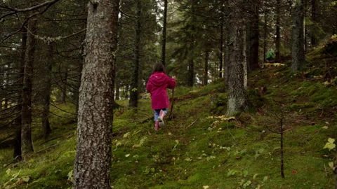 Slow motion of a small girl walking in a... | Stock Video | Pond5