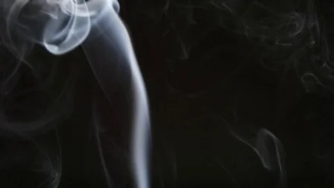 SLOW MOTION: Smoke steam into cigarette ... | Stock Video | Pond5