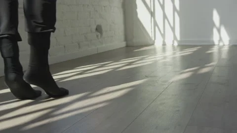 Slow motion of Spinning feet with black ... | Stock Video | Pond5