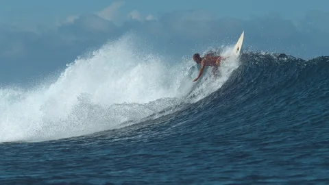 SLOW MOTION: Surfer riding a big ocean w... | Stock Video | Pond5