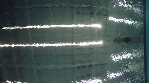 Slow motion of swimmer diving deep into ... | Stock Video | Pond5