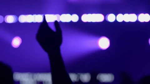 Slow-motion view of hand silhouettes par... | Stock Video | Pond5