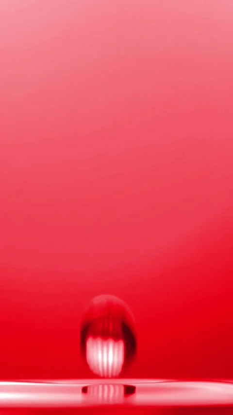 Slow Motion Water drop splash into red f... | Stock Video | Pond5