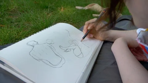Slow motion: a woman drawing croquis in ... | Stock Video | Pond5