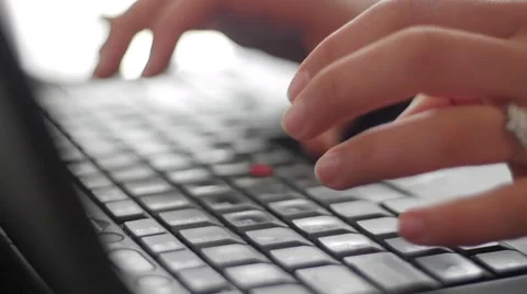 Slow motion of a woman fingers typing on... | Stock Video | Pond5