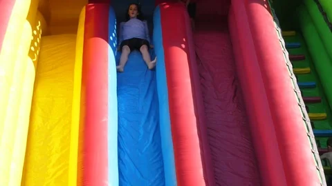 Girl Going Down Waterslide Stock Footage ~ Royalty Free Stock Videos ...