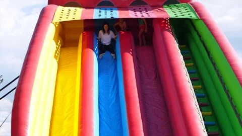 Girl Going Down Waterslide Stock Footage ~ Royalty Free Stock Videos ...