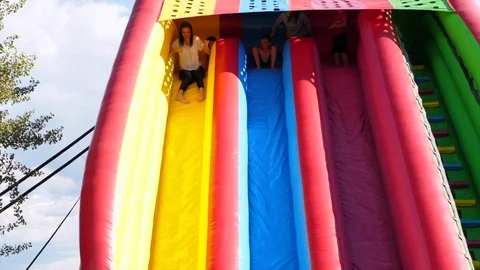 Girl Going Down Waterslide Stock Footage ~ Royalty Free Stock Videos ...