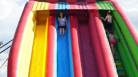 Girl Going Down Waterslide Stock Footage ~ Royalty Free Stock Videos ...