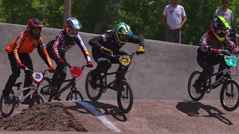 Slow Motion: Young BMX Racers in Compet... | Stock Video | Pond5