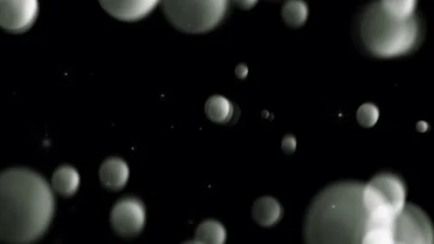 Slow movement of round balls on a black ... | Stock Video | Pond5