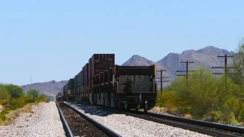 Slow moving freight train loaded with ca... | Stock Video | Pond5