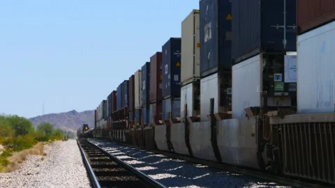 Slow moving freight train loaded with ca... | Stock Video | Pond5